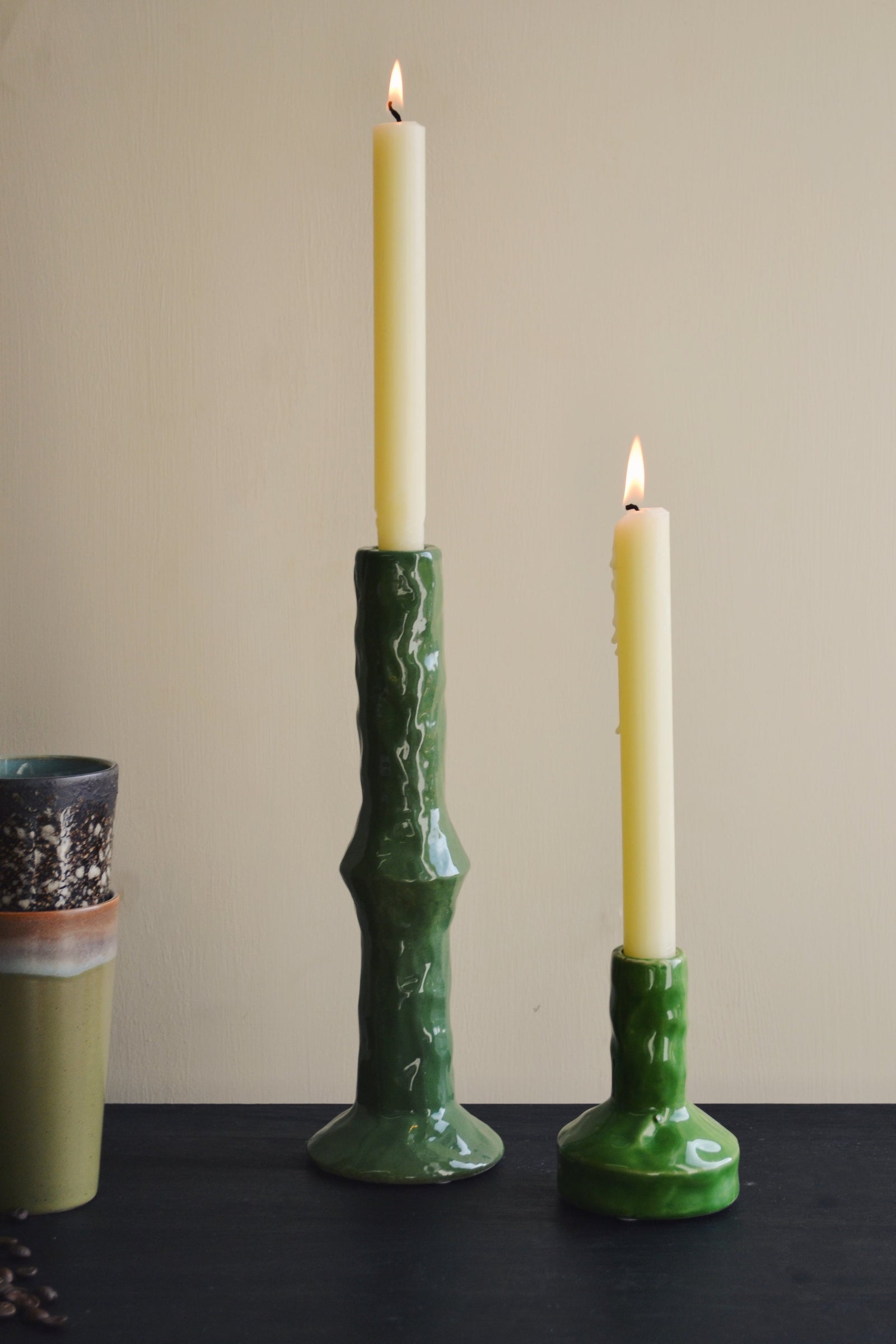 green candlestick holder